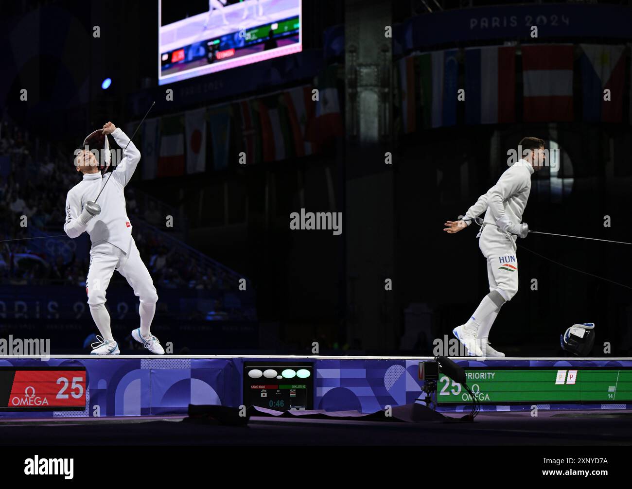 KANO Koki of Japan (L) and SIKLOSI Gergely of Hungary react after competing in the Men's Épée ...