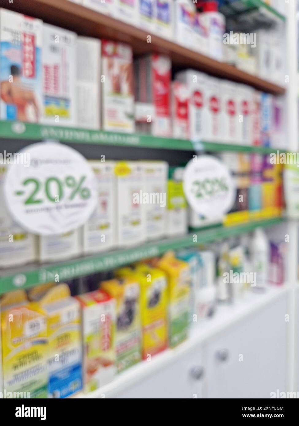 Defocus background with stocked shelves on sale inside the drugstore ...