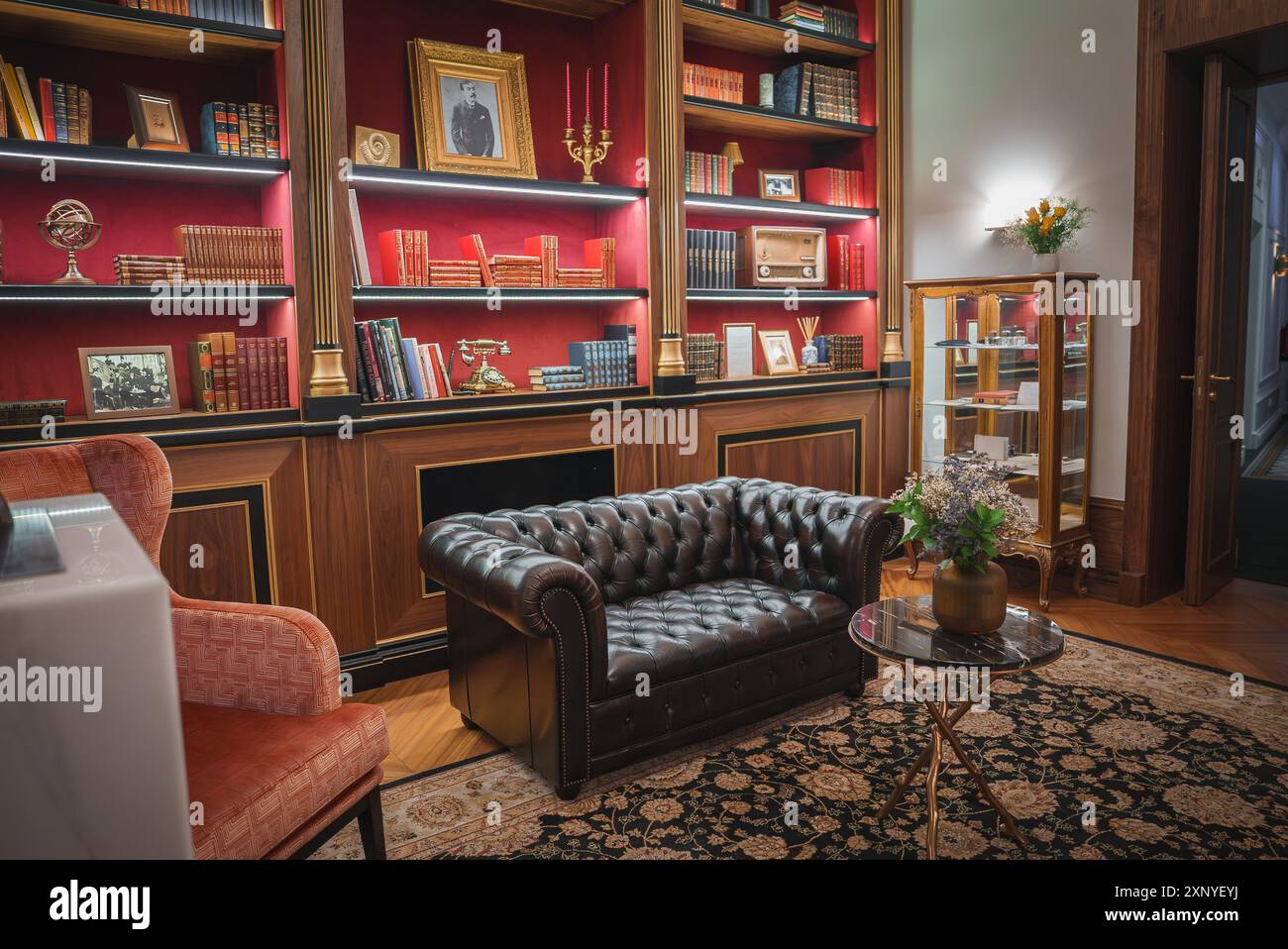 Luxurious Hotel Library with Chesterfield Sofa and Elegant Decor Stock ...