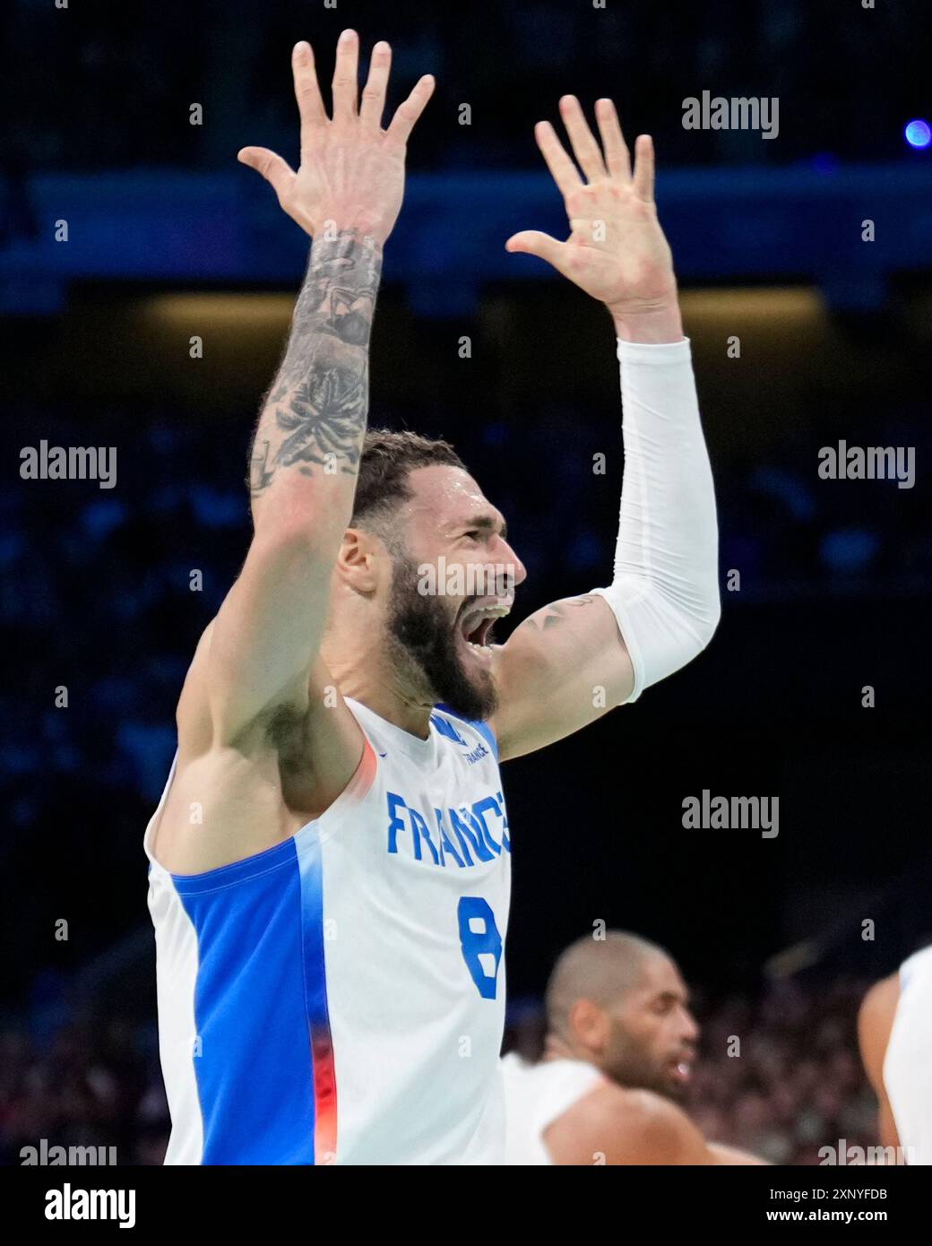 Isaia Cordinier, of France, celebrates in a game against Germany in a ...