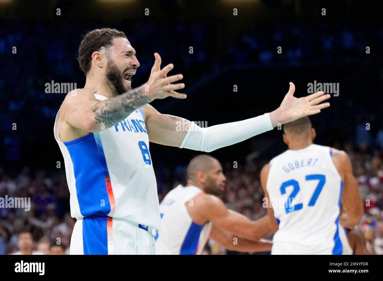 Isaia Cordinier, of France, celebrates in a game against Germany in a ...