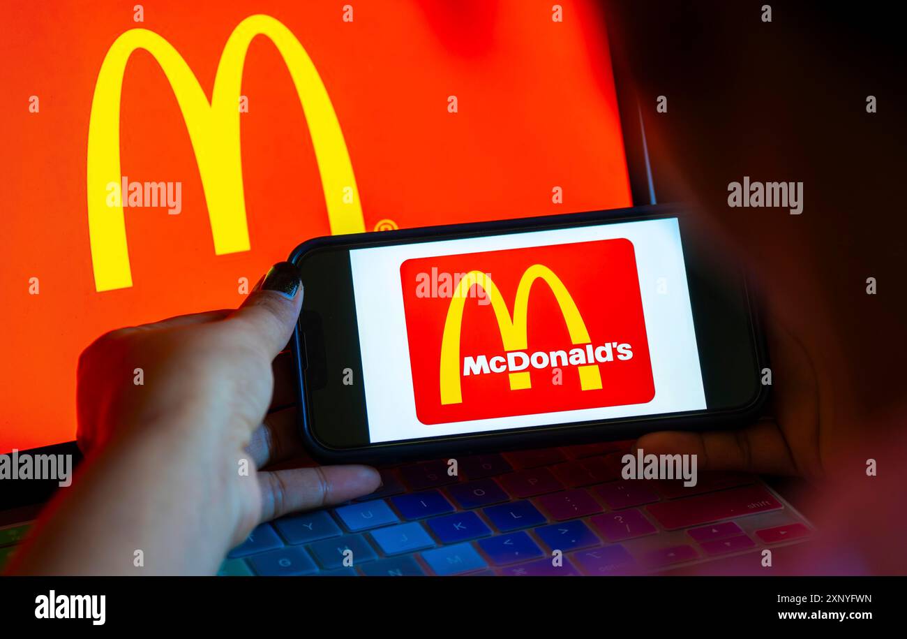 In this photo illustration, McDonald's logo is displayed on a ...