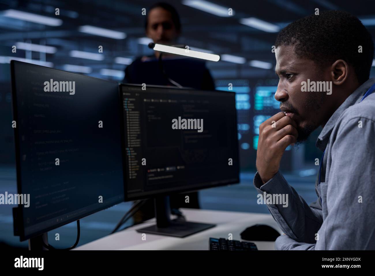 Stressed technician in data center hi-res stock photography and images - Alamy