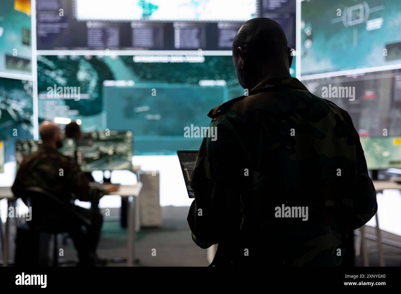 Infantry unit soldier gathering intelligence for the field mission, operating high tech ...