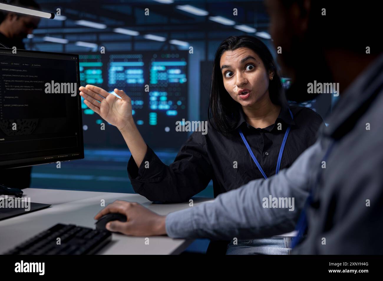 Technician Arguing With Colleague After Seeing Error In Server Hub While Overseeing