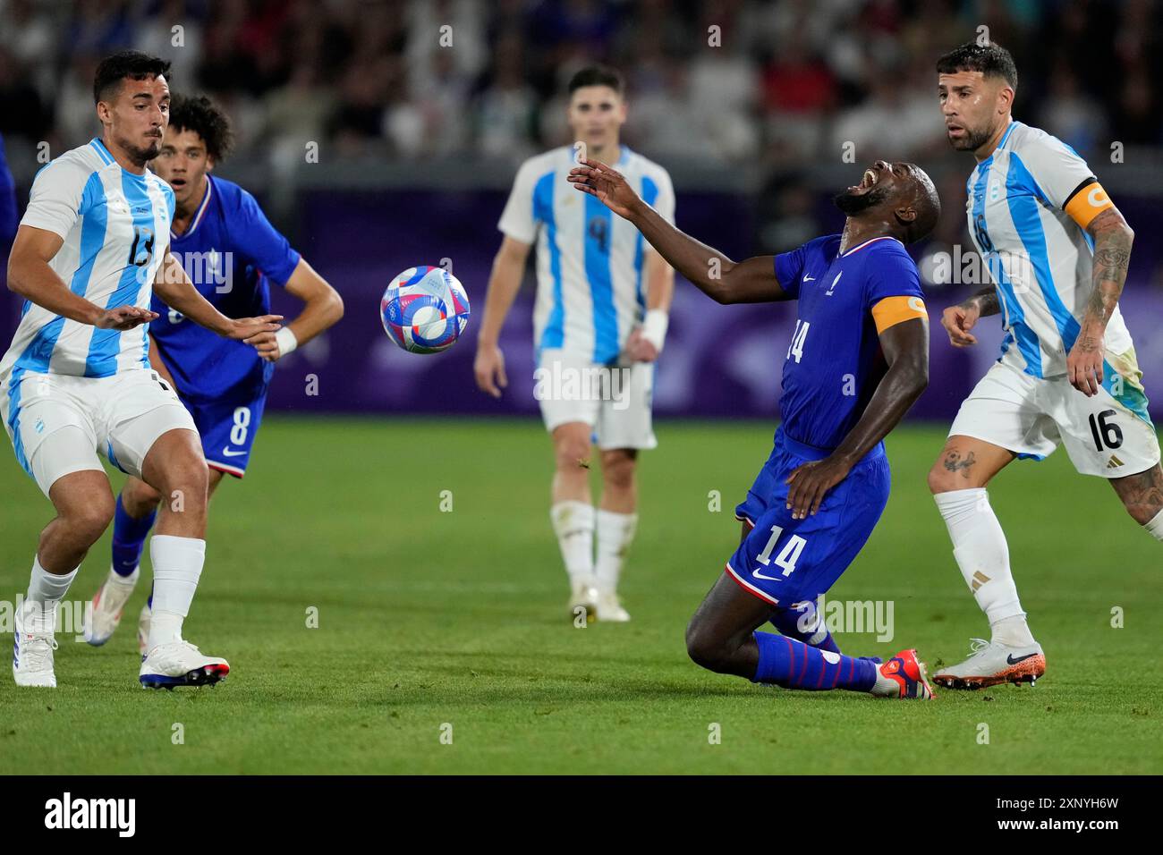 France's Jean-Philippe Mateta falls during a quarter final soccer match ...