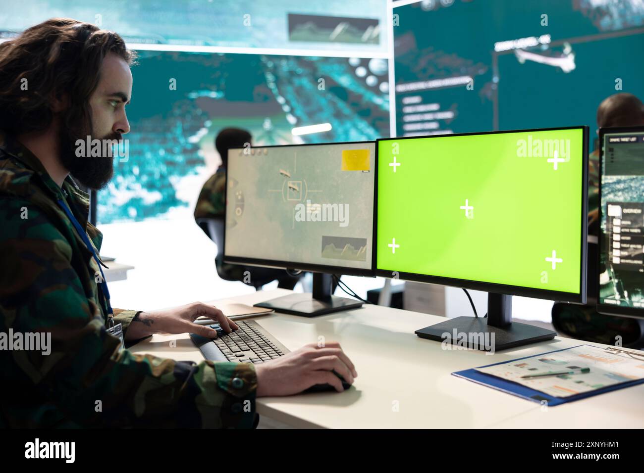 Army specialist employs satellite radar surveillance and mockup screen ...