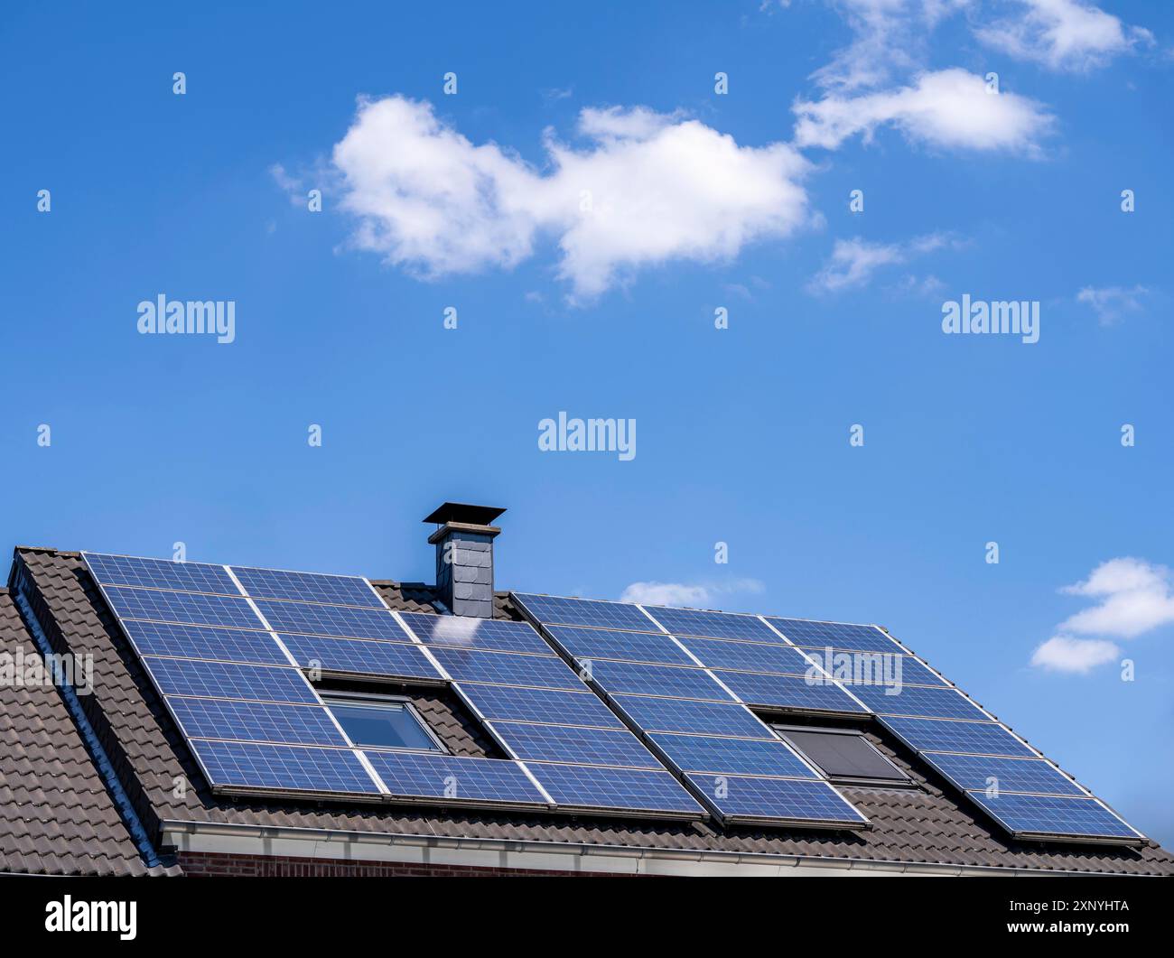 Solar system on the pitched roof of a residential building ...