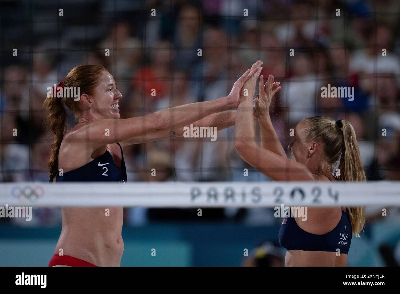 US' Kelly Cheng, left, and Sara Hughes celebrate during the women's ...