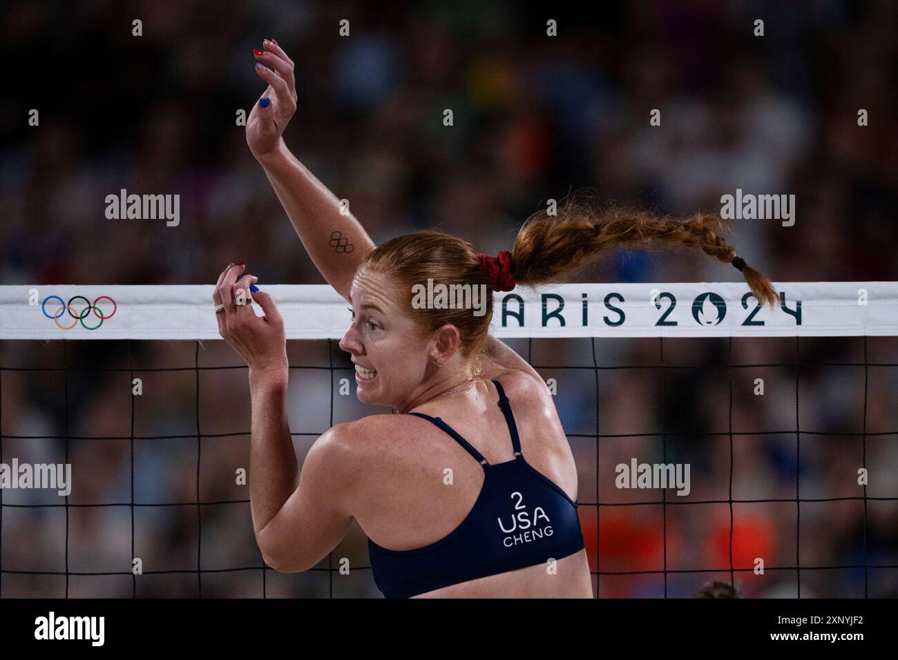 US' Kelly Cheng eyes the ball during the women's pool C beach ...