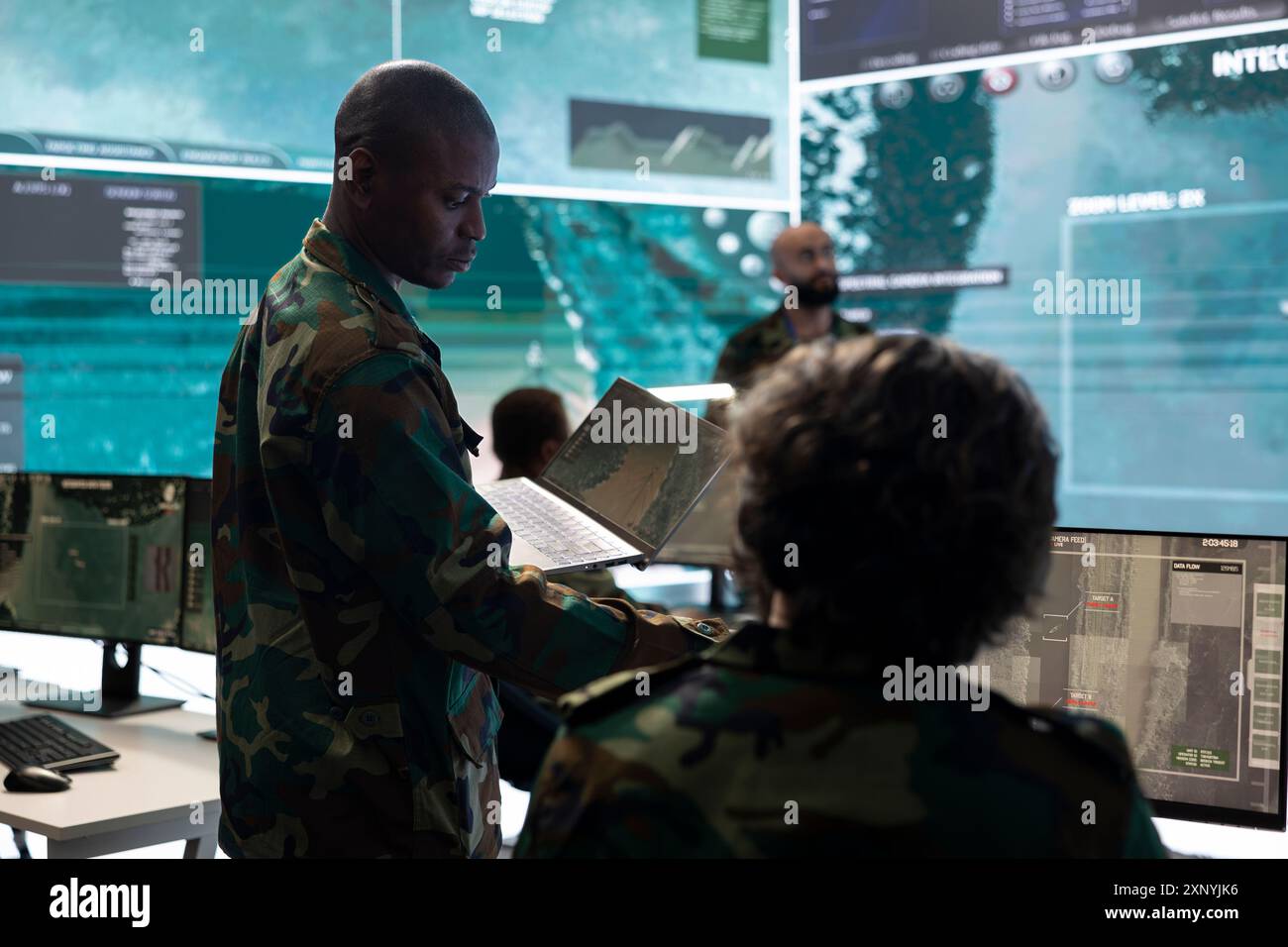 Intelligence analyst collecting satellite surveillance real time data and transmitting ...