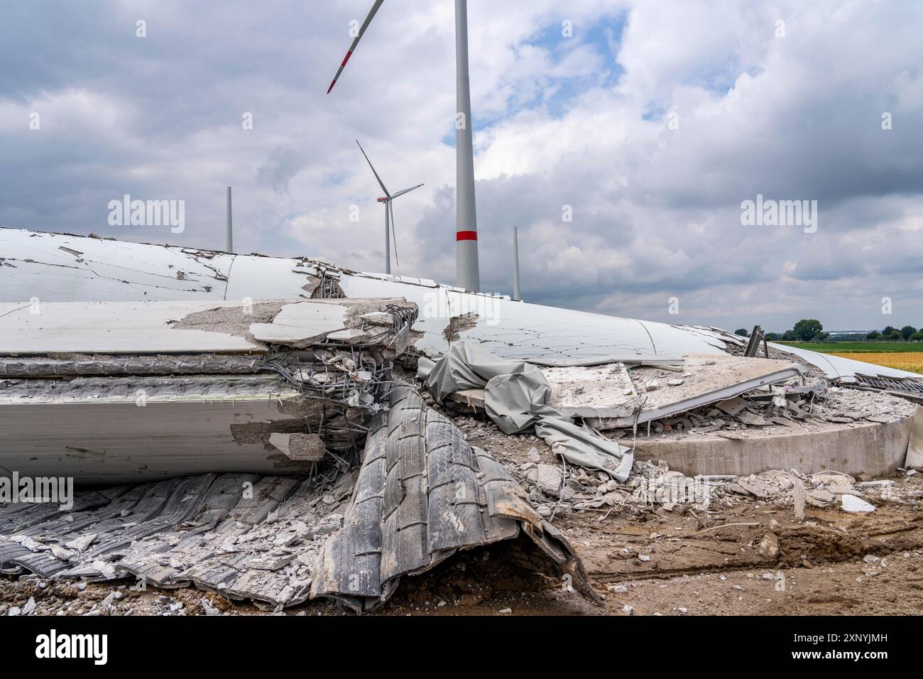 Demolished tower of a 20 year old wind turbine, in the Werl wind farm ...