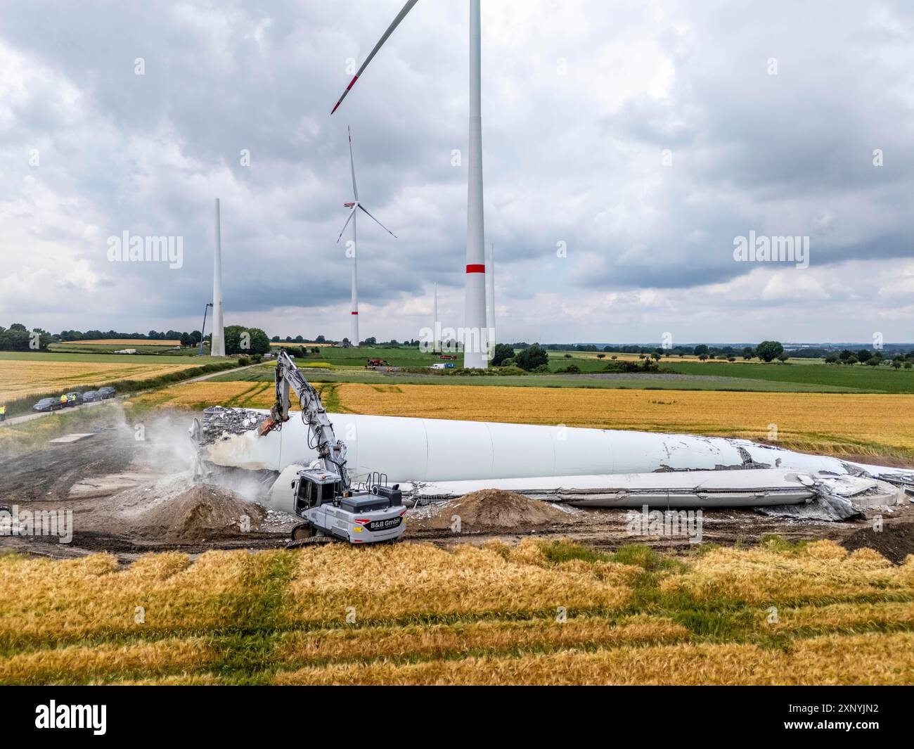 Demolished tower of a 20 year old wind turbine, in the Werl wind farm ...