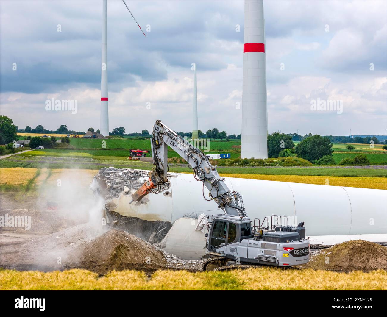 Demolished tower of a 20 year old wind turbine, in the Werl wind farm ...