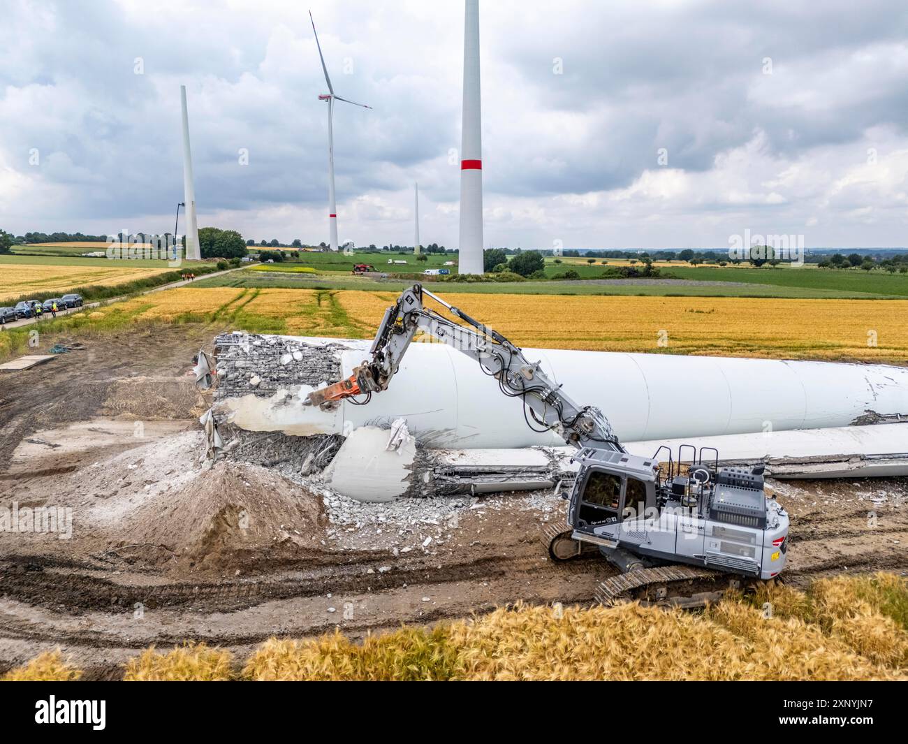 Demolished tower of a 20 year old wind turbine, in the Werl wind farm ...