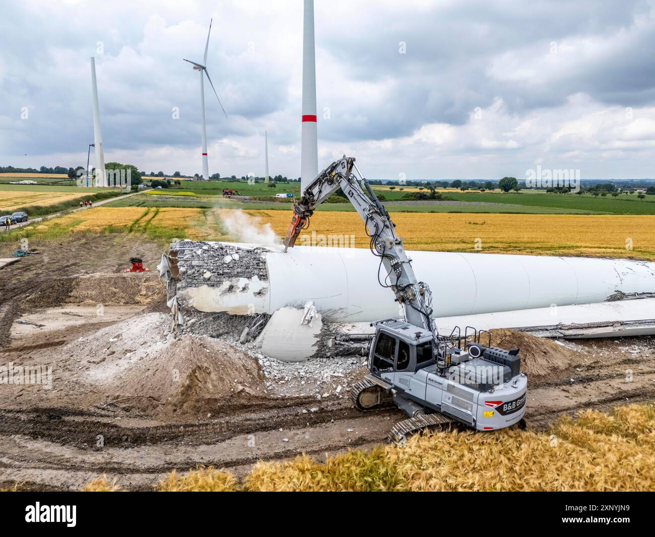 Demolished tower of a 20 year old wind turbine, in the Werl wind farm ...
