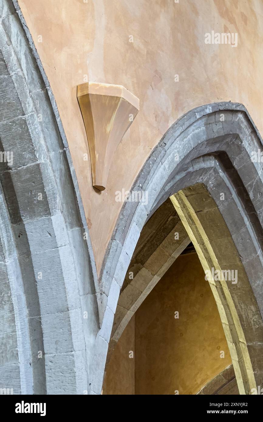 Vertical shot shows beautiful hand crafted arches in an ancient ...