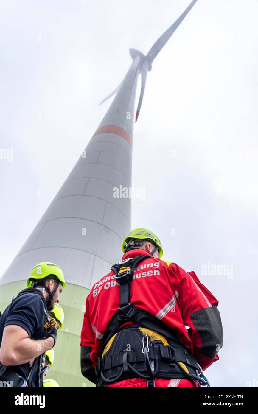 Height rescuers from the Oberhausen fire brigade practise abseiling ...