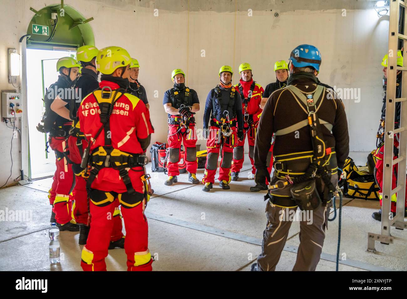 Height rescuers from the Oberhausen fire brigade practise abseiling ...