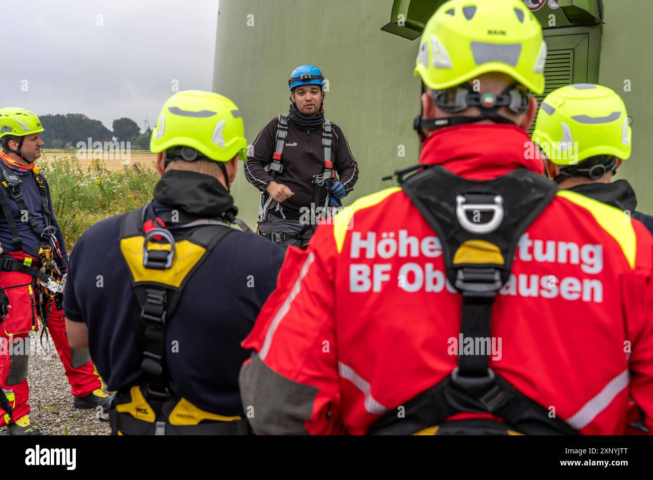 Height rescuers from the Oberhausen fire brigade practise abseiling ...