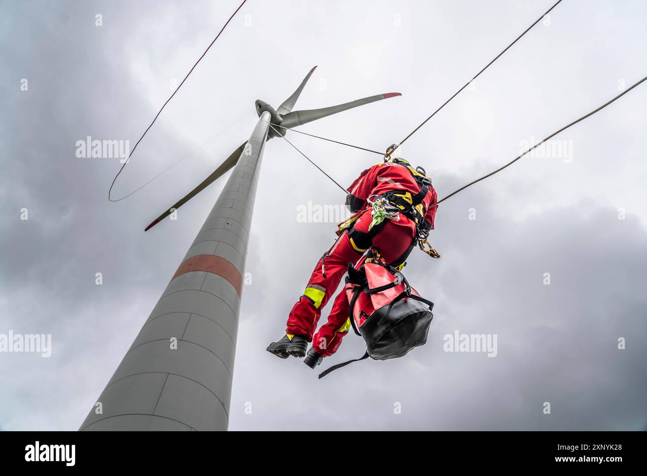 Height rescuers from the Oberhausen fire brigade practise abseiling ...