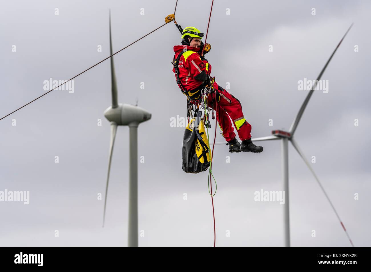 Height rescuers from the Oberhausen fire brigade practise abseiling ...