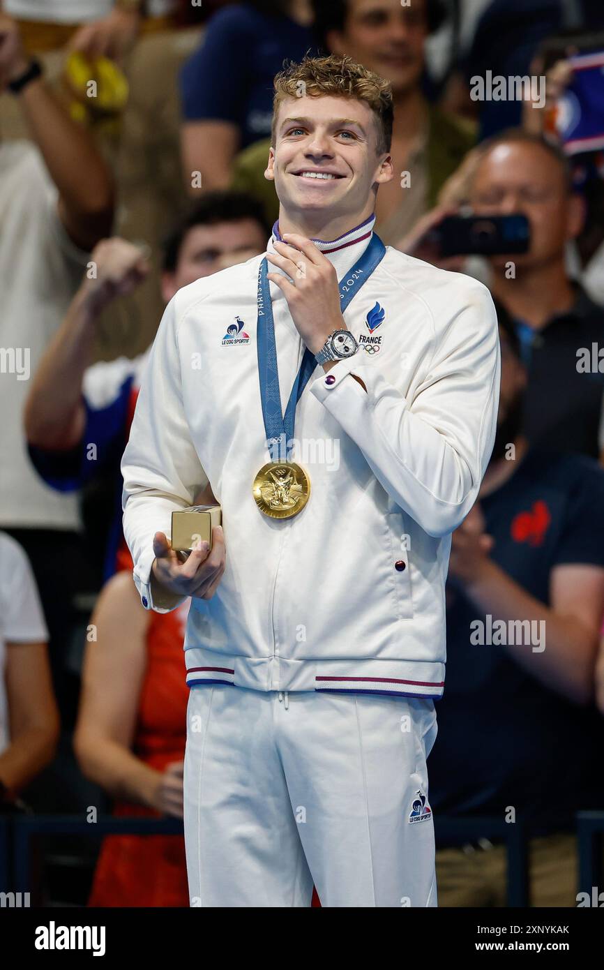 Gold medallist Leon Marchand of France, poses after Men's 200m ...