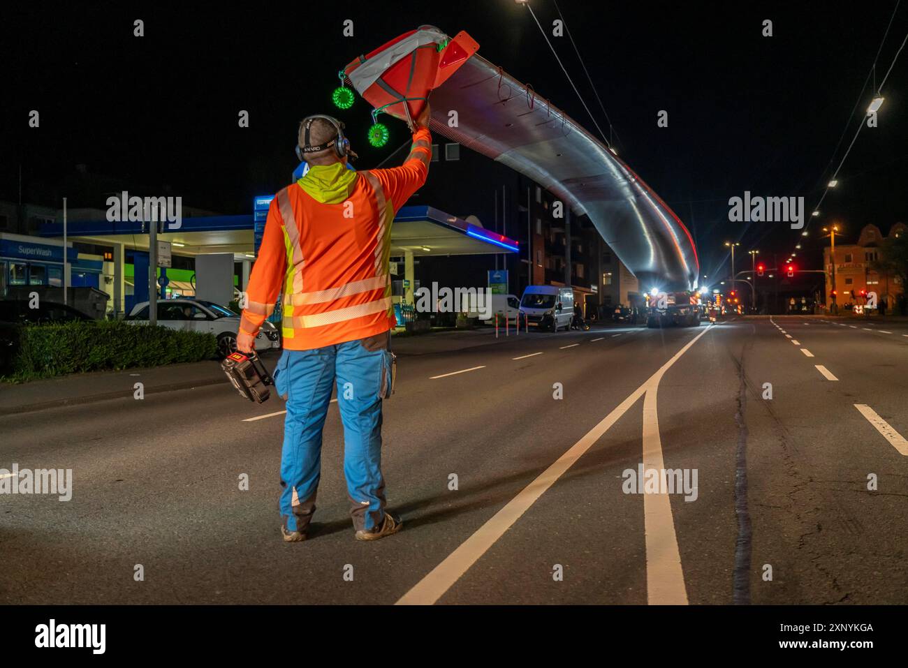 Transport of a 68 metre long, 22 tonne blade of a wind turbine, here in ...