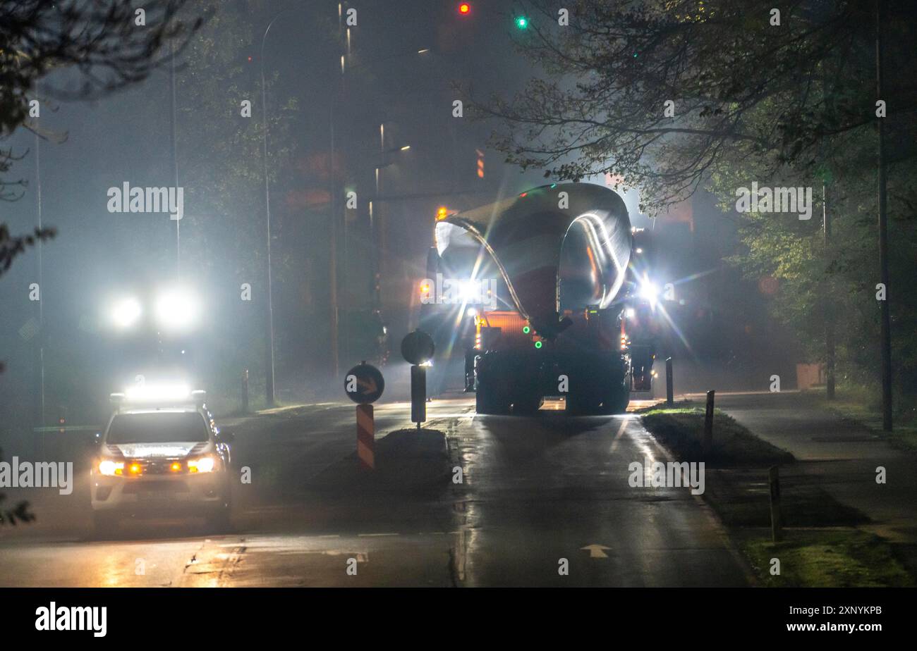 Transport of a 68 metre long, 22 tonne blade of a wind turbine, here in ...