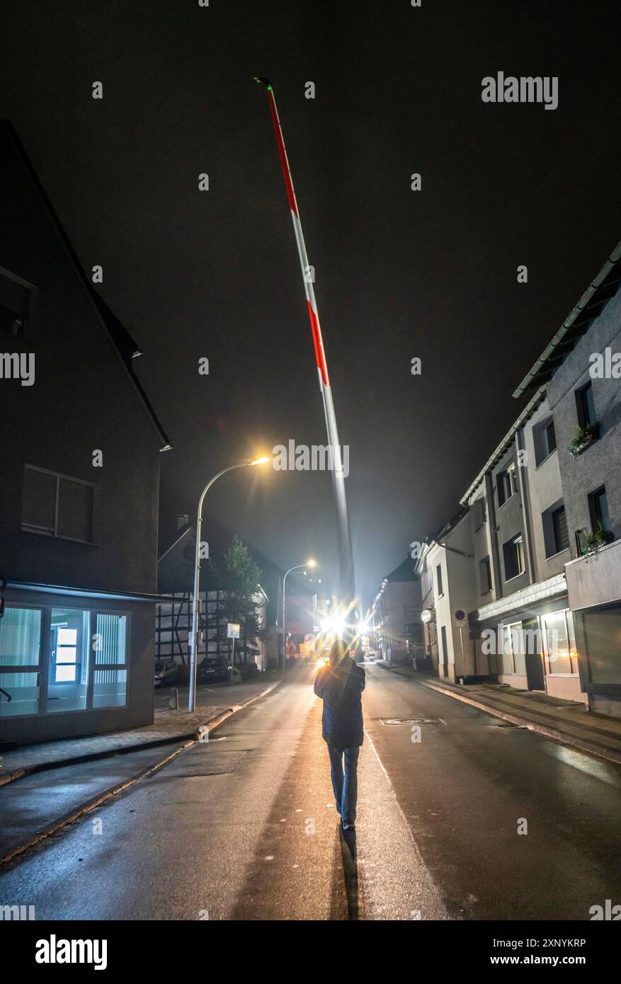 Transport of a 68 metre long, 22 tonne blade of a wind turbine, here in ...