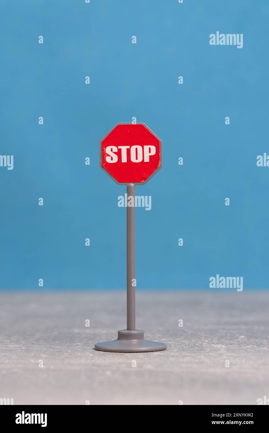 Stop sign on a blue background. Conceptual image of attention Stock ...