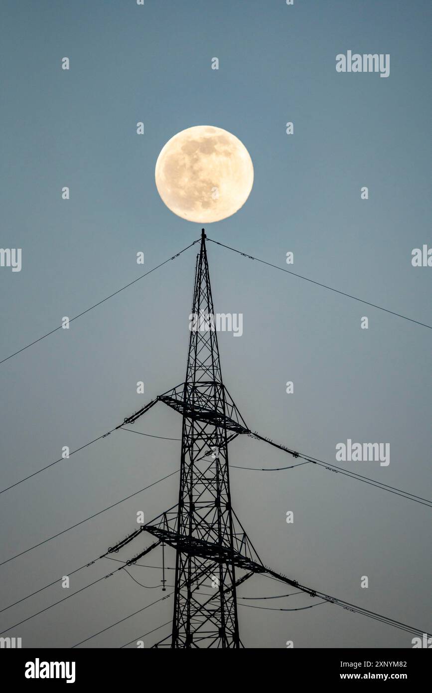 Full moon, high voltage pylon, pylon, Germany Stock Photo - Alamy