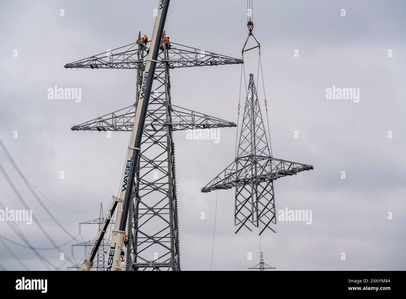 Installation of a high-voltage pylon, construction of a new line route ...