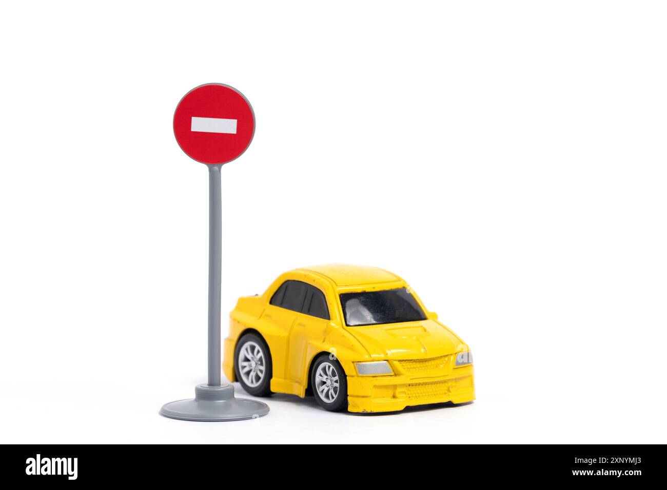 Yellow car with stop sign isolated on white background Stock Photo - Alamy