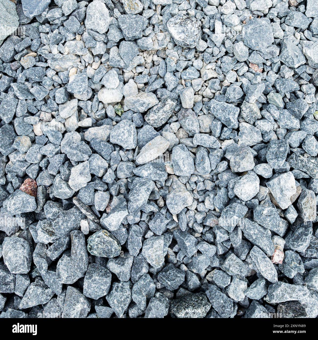 Basalt crushed gray stone texture background Stock Photo - Alamy