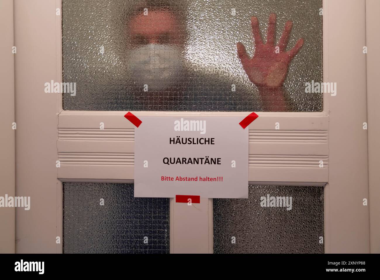 Symbolic image Domestic quarantine, man is in isolation at home due to ...