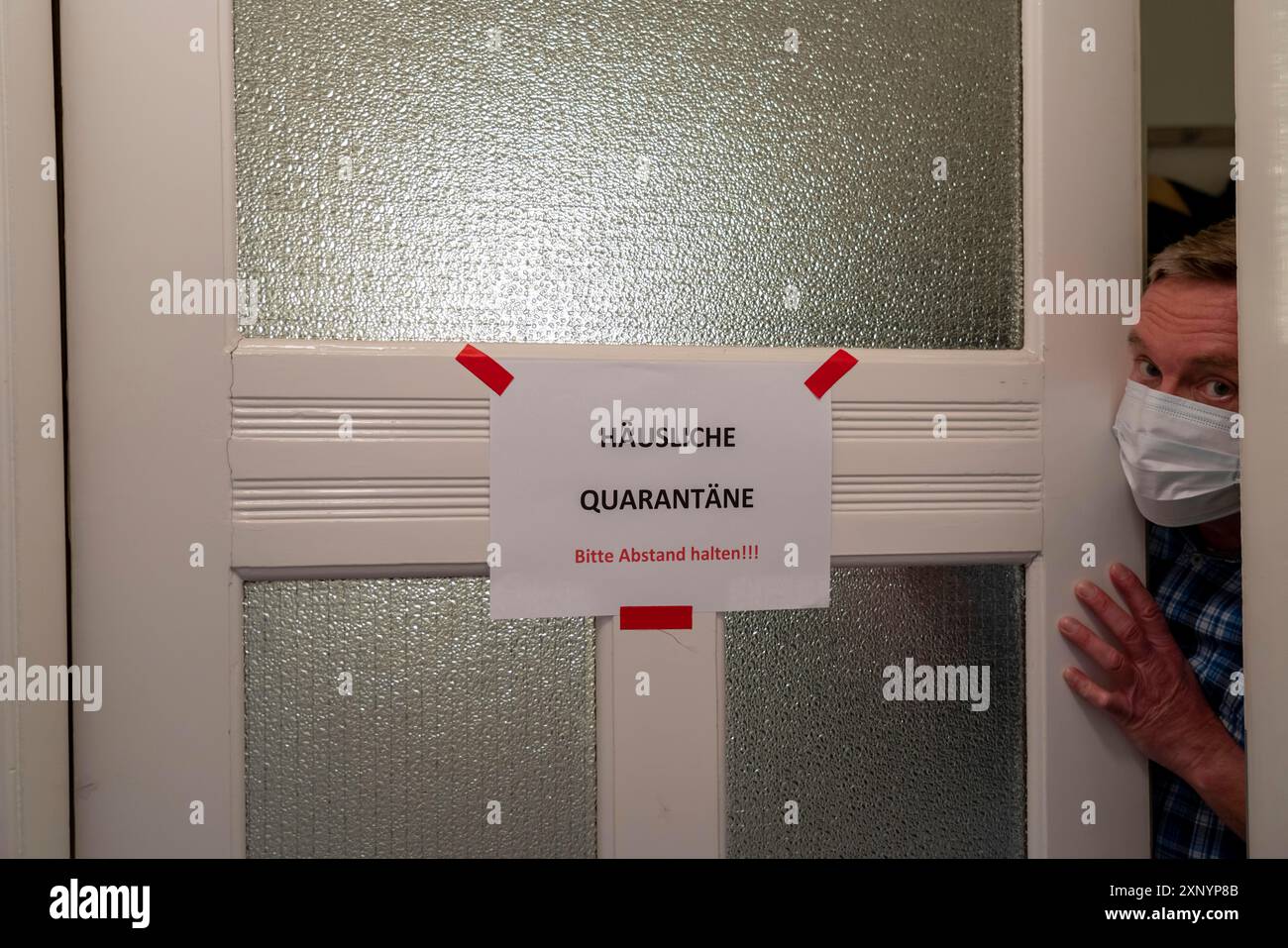 Symbolic image Domestic quarantine, man is in isolation at home due to ...