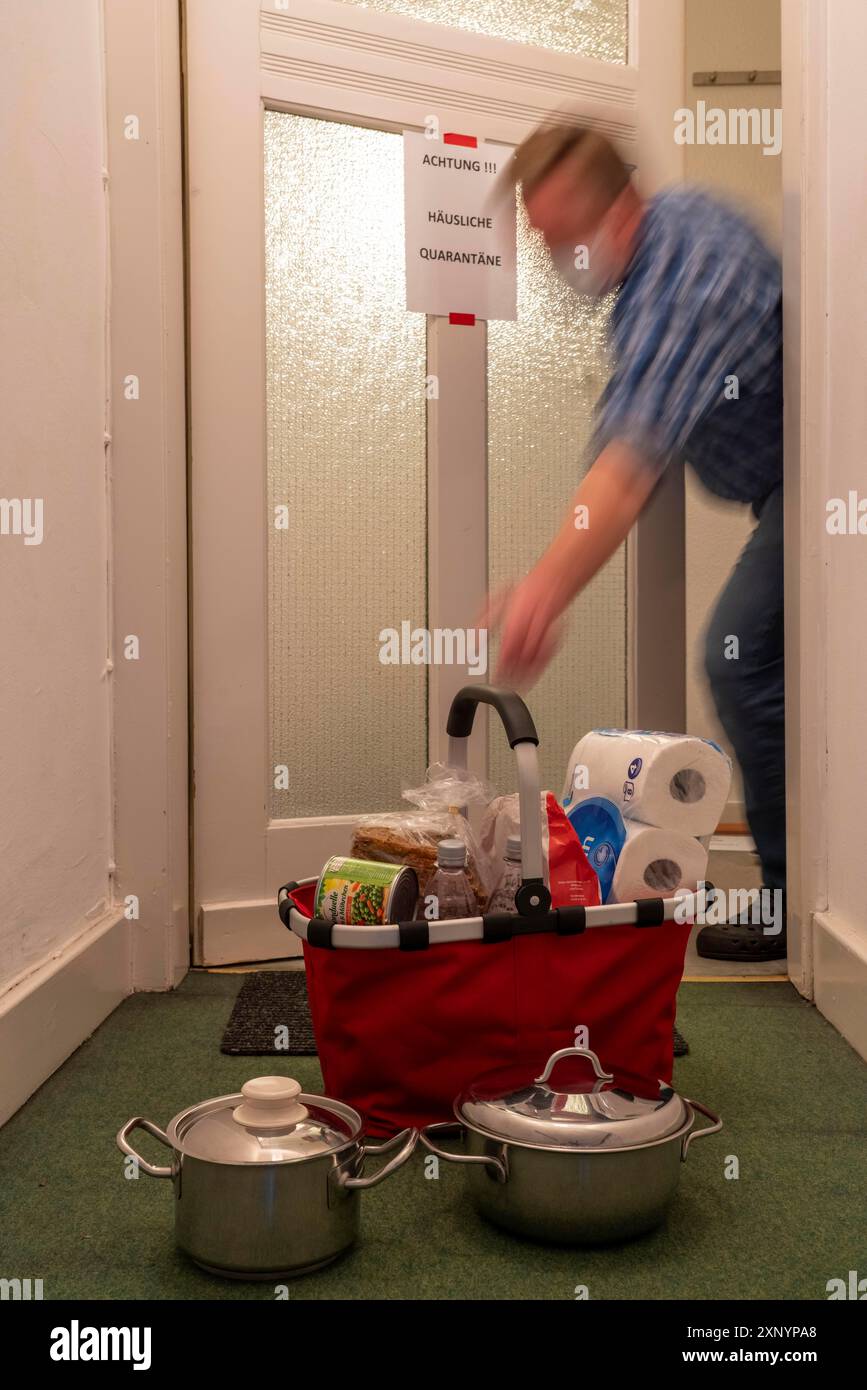 Symbolic image Domestic quarantine, man is in isolation at home due to ...