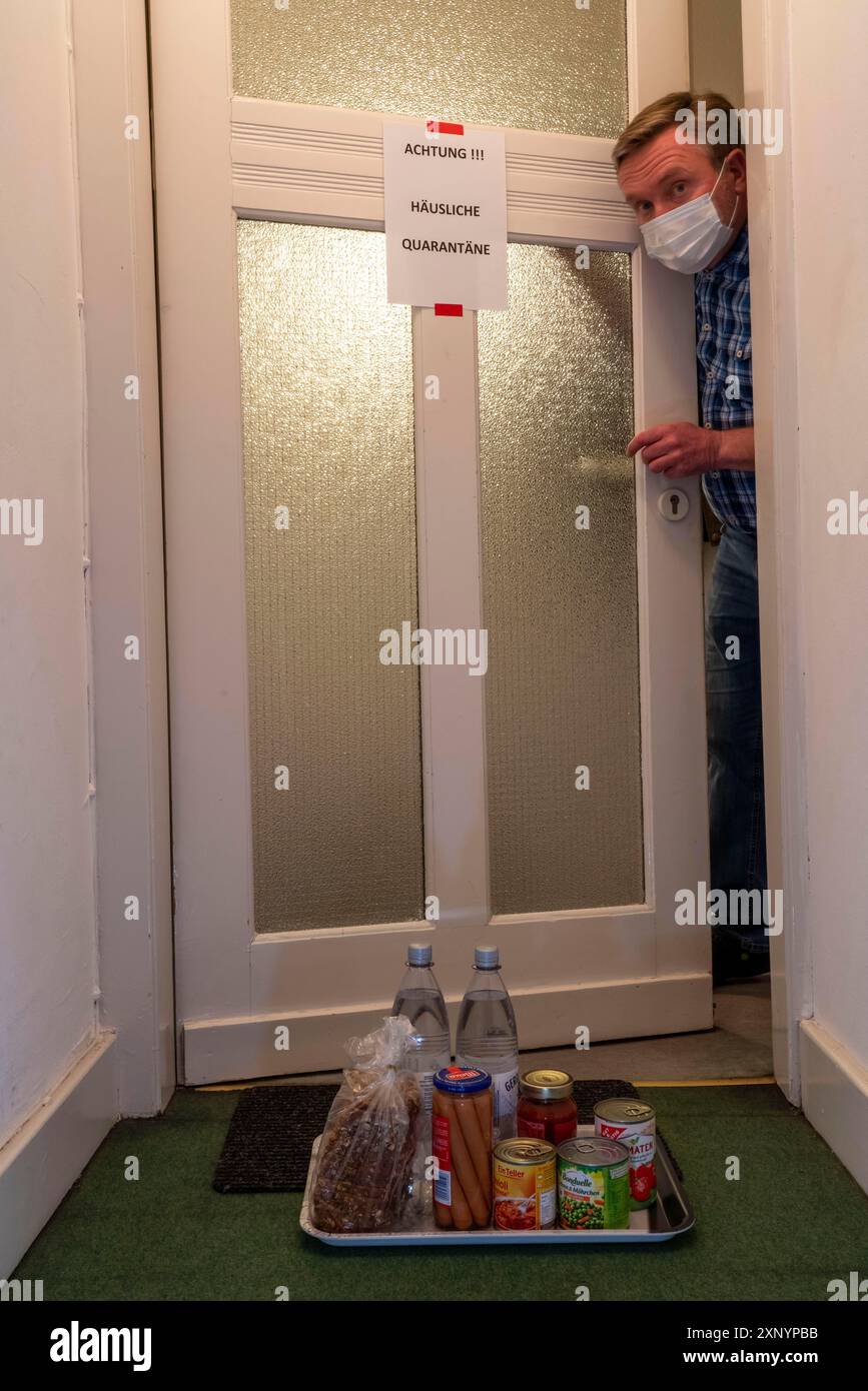 Symbolic image Domestic quarantine, man is in isolation at home due to ...