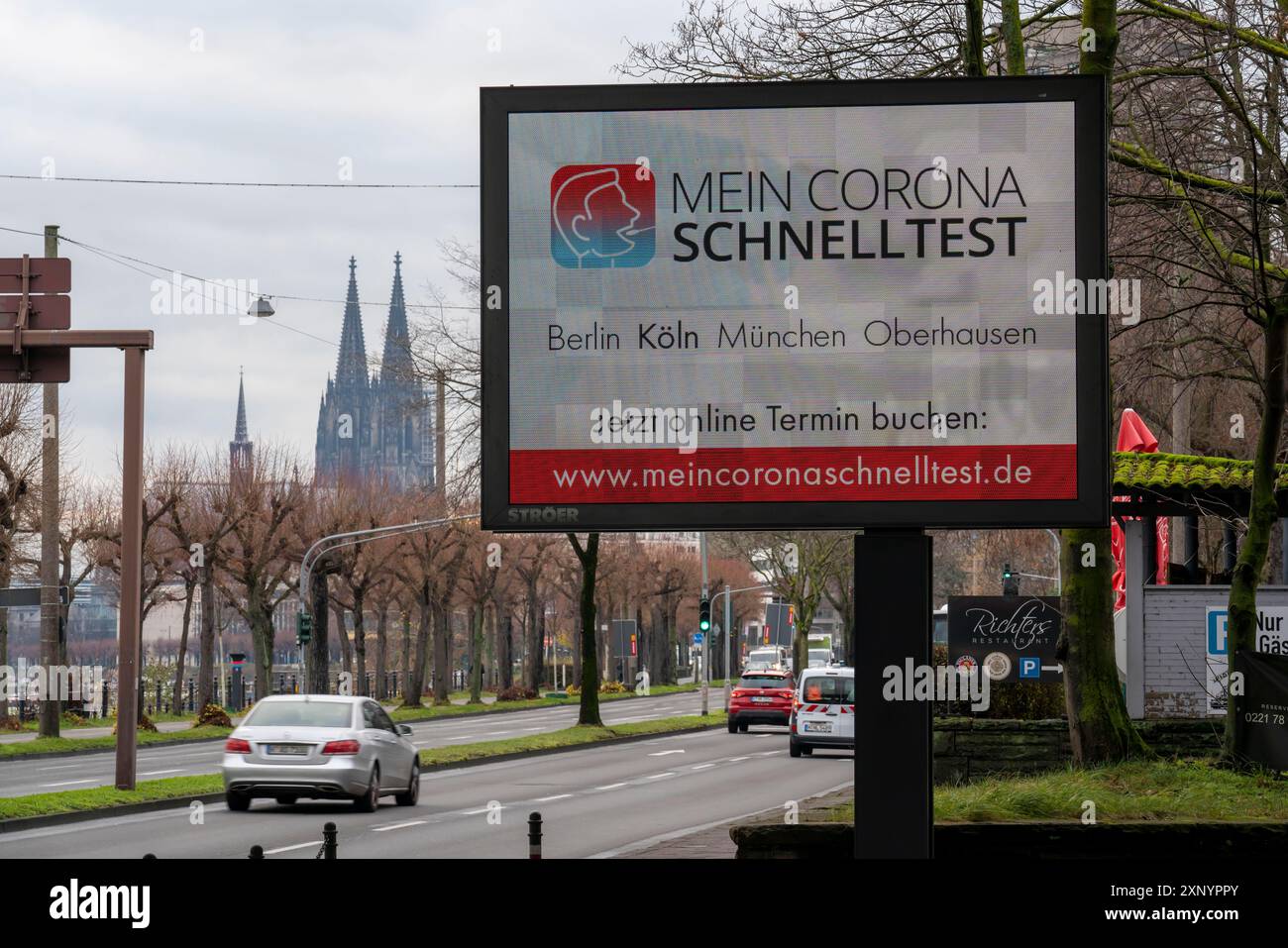 LED billboard, with digital advertising for Corona rapid tests, in the ...