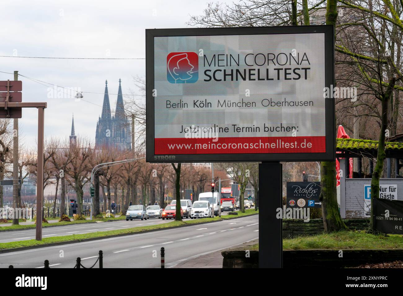 LED billboard, with digital advertising for Corona rapid tests, in the ...