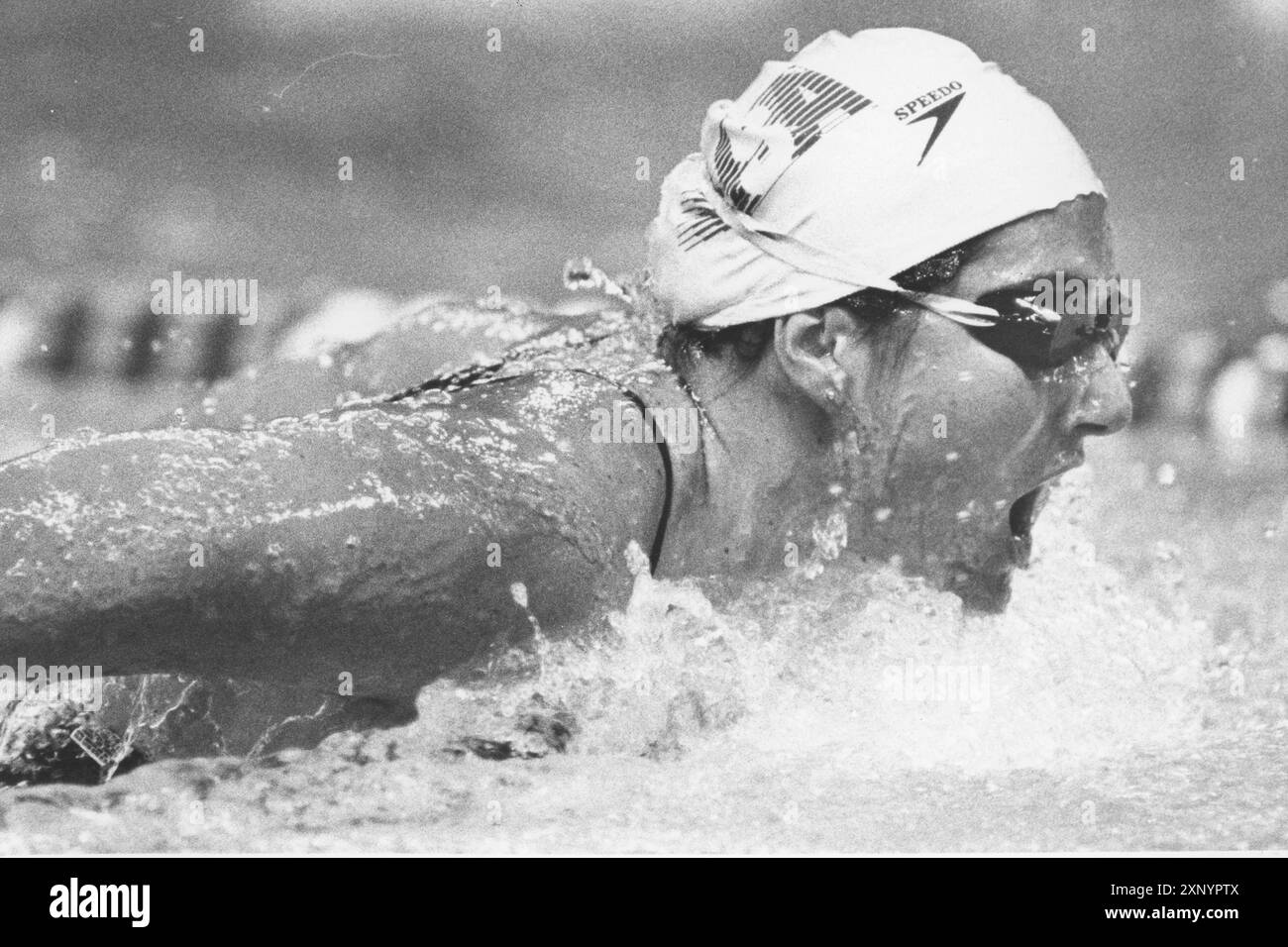 Female swimmer wearing swim cap Black and White Stock Photos & Images ...