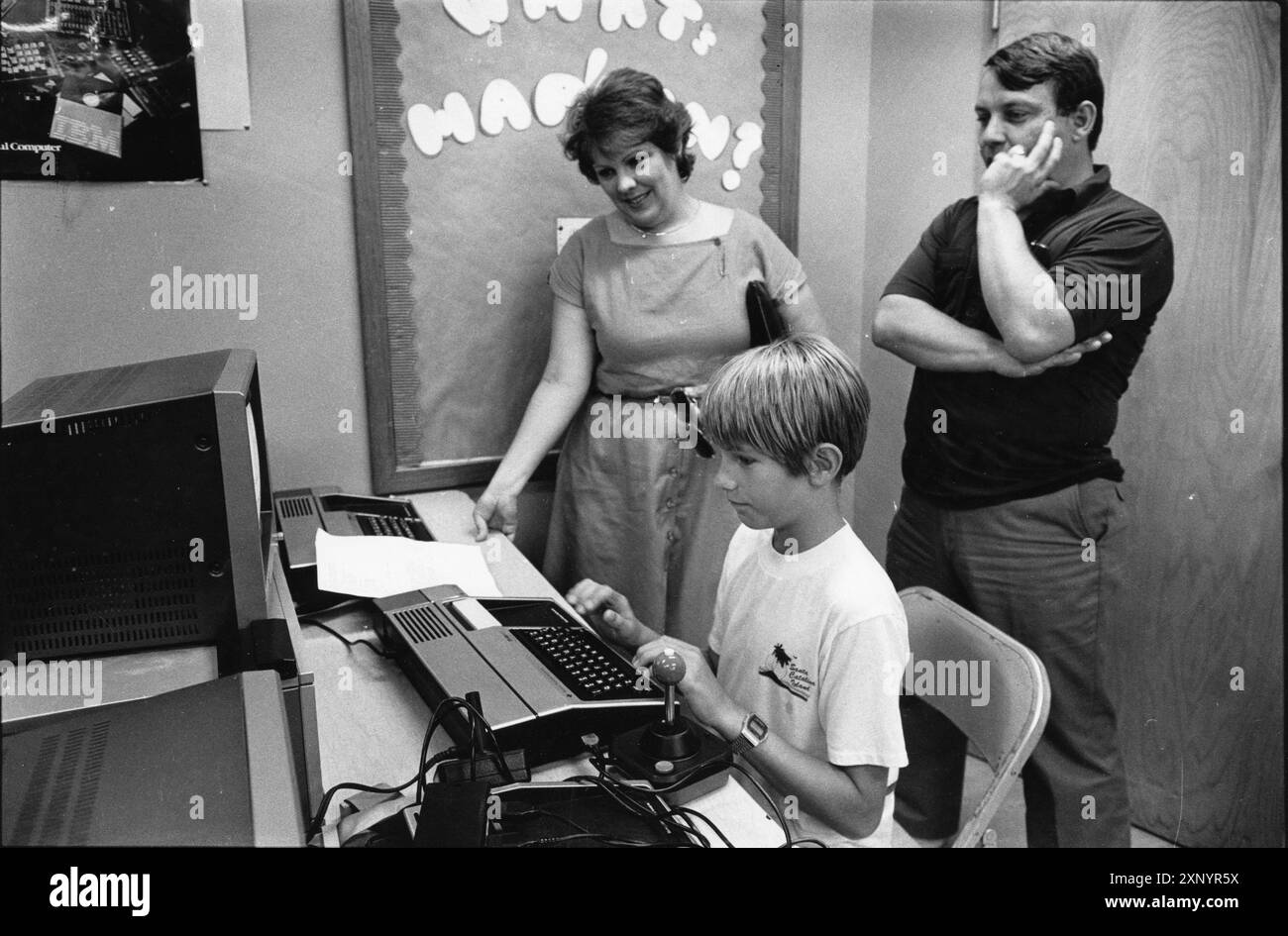 Child at the back of a classroom Black and White Stock Photos & Images ...