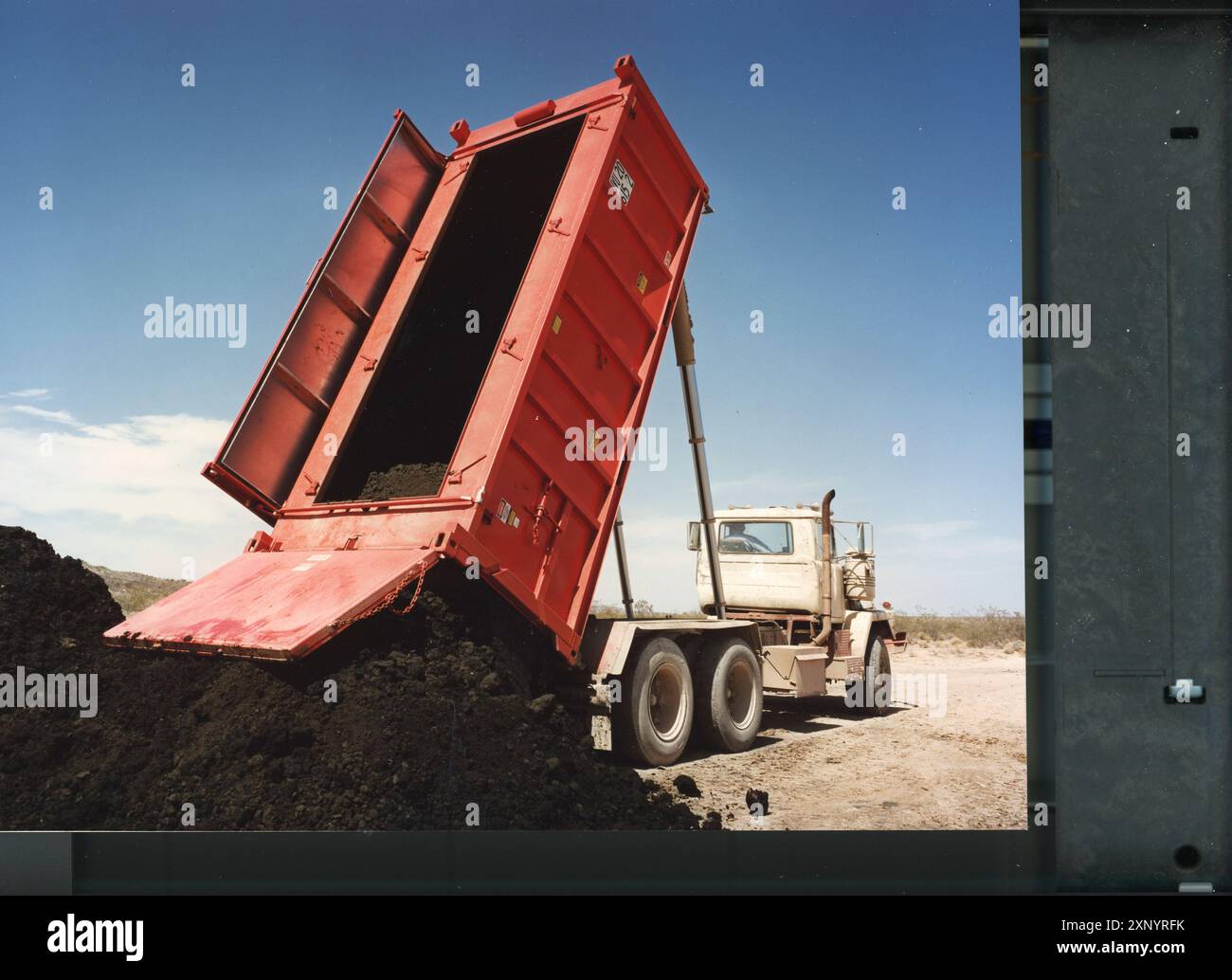 Sierra Blanca Texas USA, 1995: A dump truck deposits sludge brought by ...