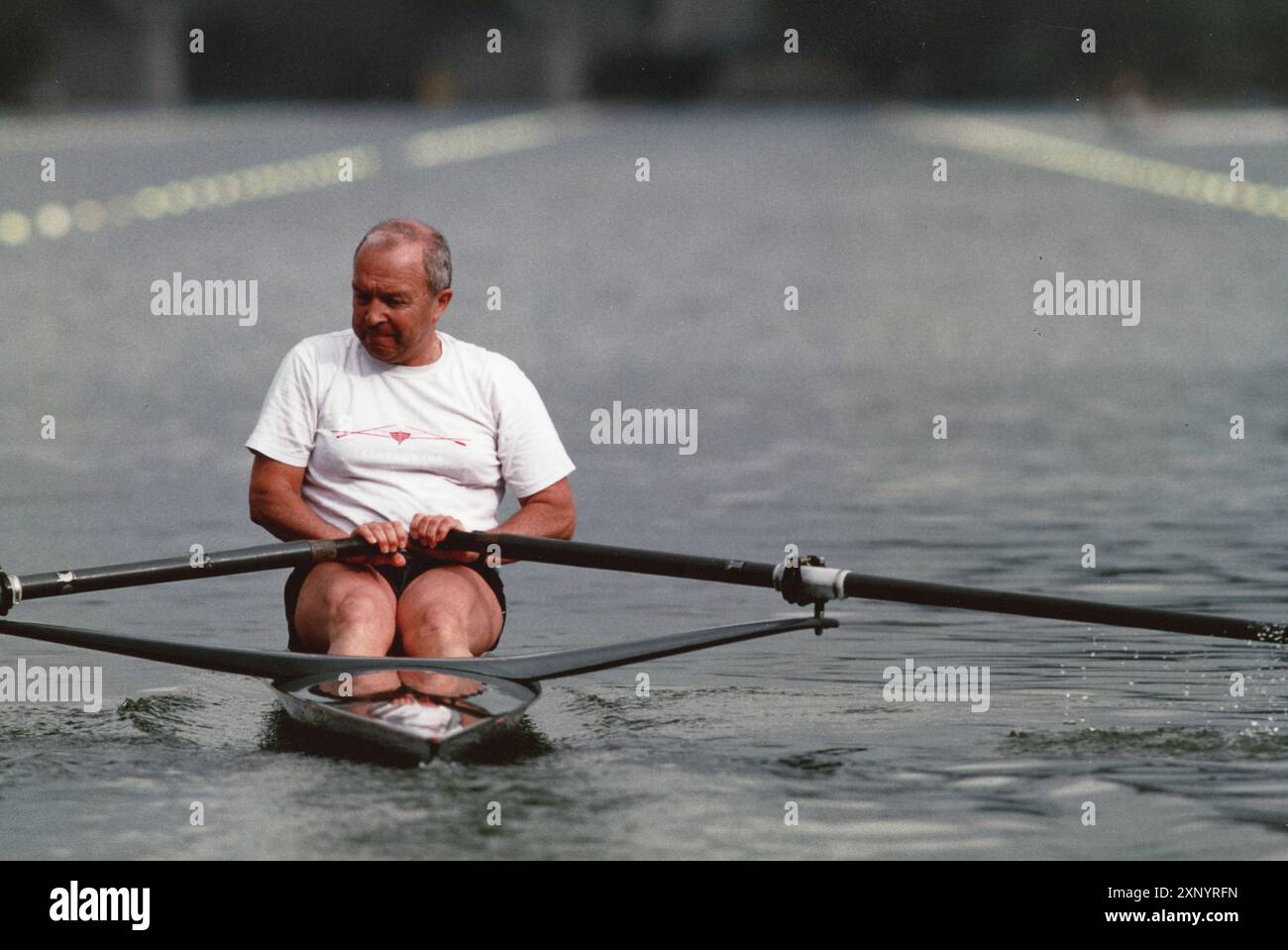 Austin Texas USA, 1993: Older male rower warming up on Town Lake in ...