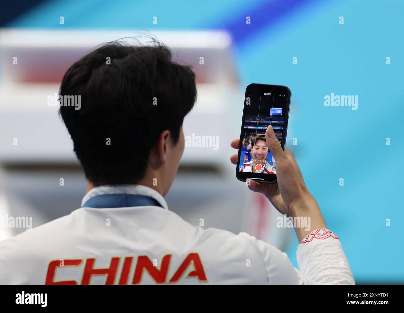 Paris, France. 2nd Aug, 2024. Bronze medalist Wang Shun of China take selfies after the victory ...