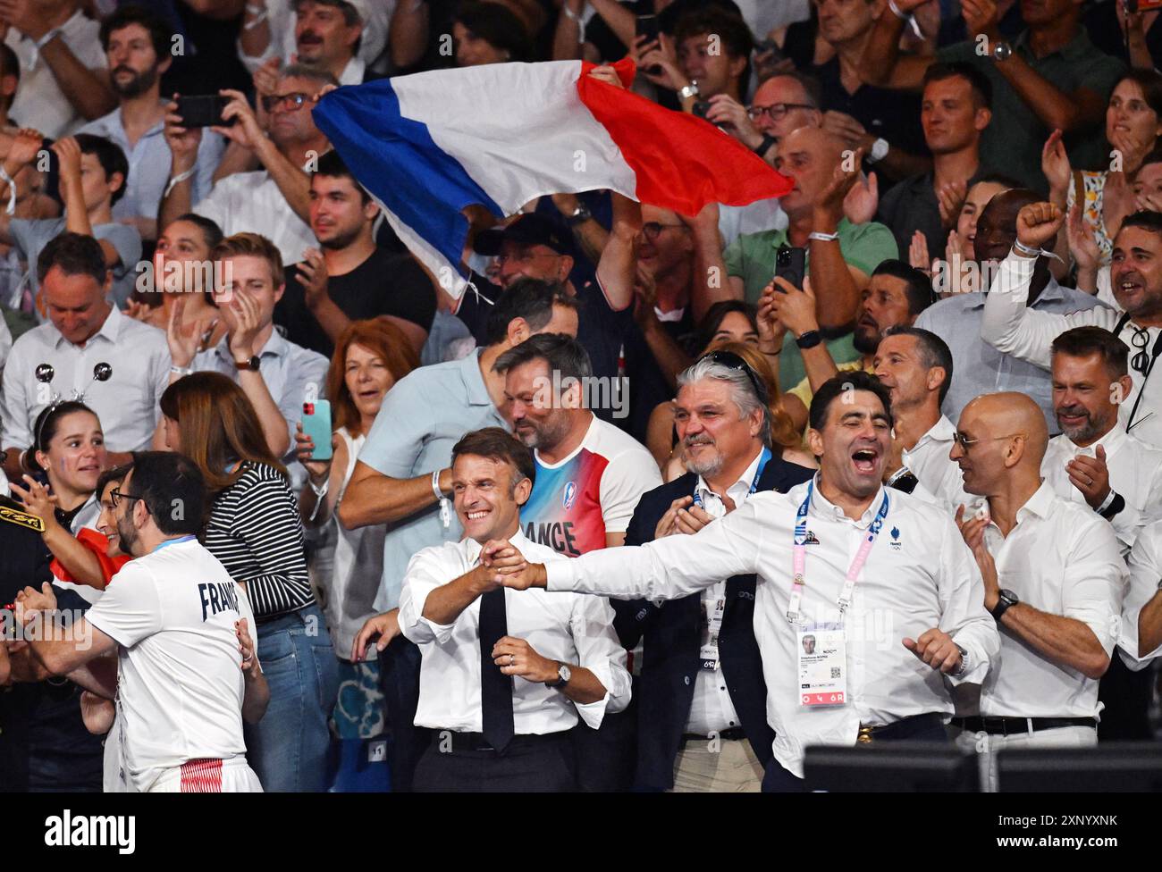 Paris, France. 2nd Aug, 2024. French President Emmanuel Macron cheers ...