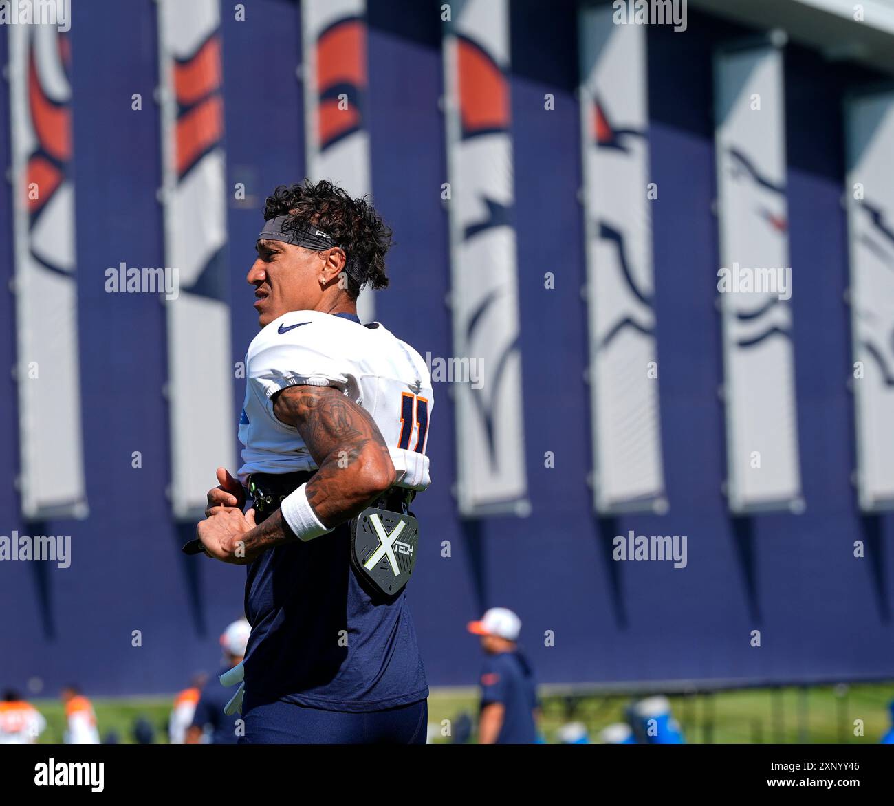 Denver Broncos wide receiver Josh Reynolds puts on equipment as he ...