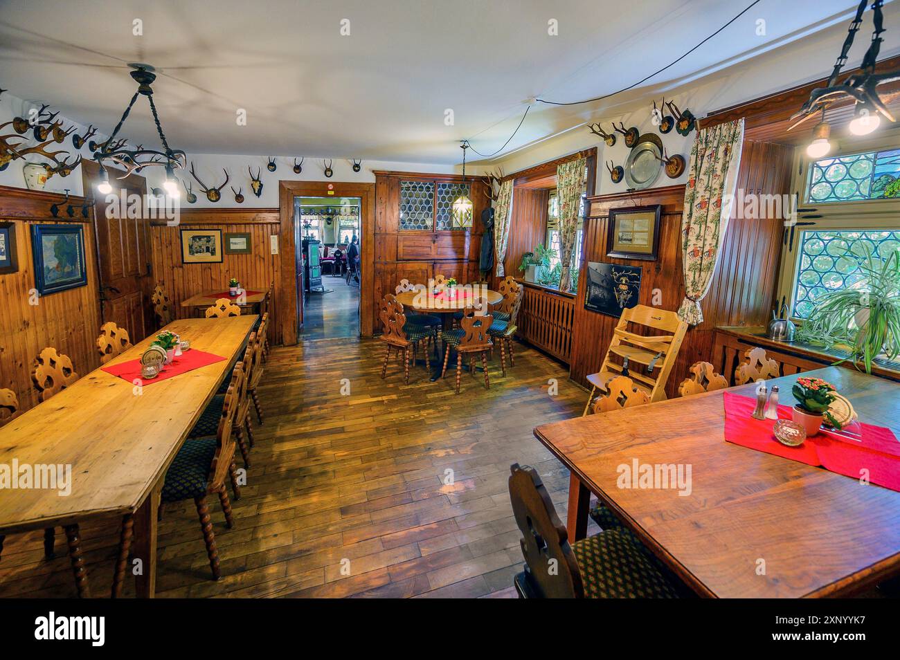 Guest parlour with antlers and tiled stove in the Gasthof Adler ...