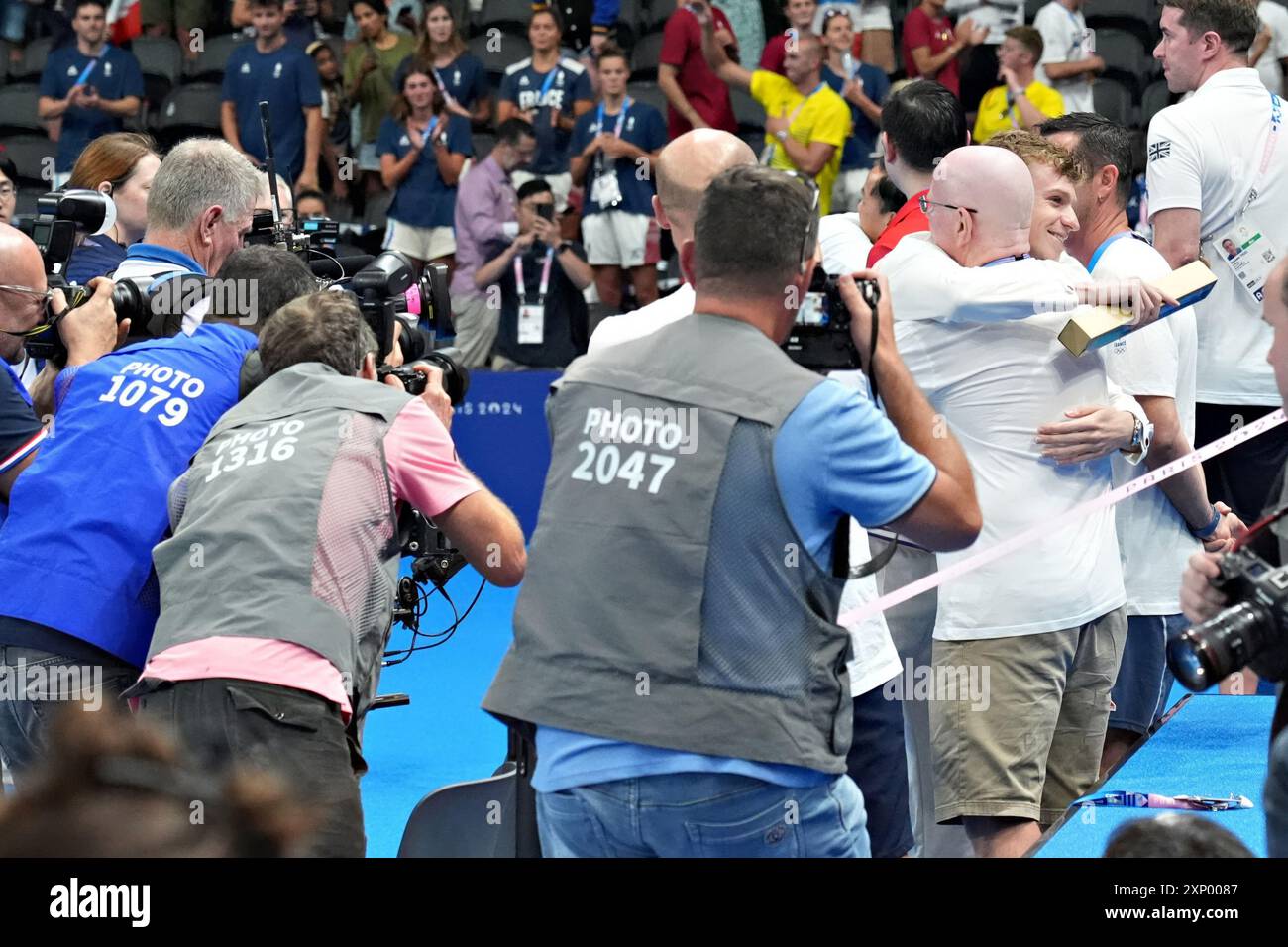 Paris, France. 02nd Aug, 2024. Photographers swarm Men's 200m ...